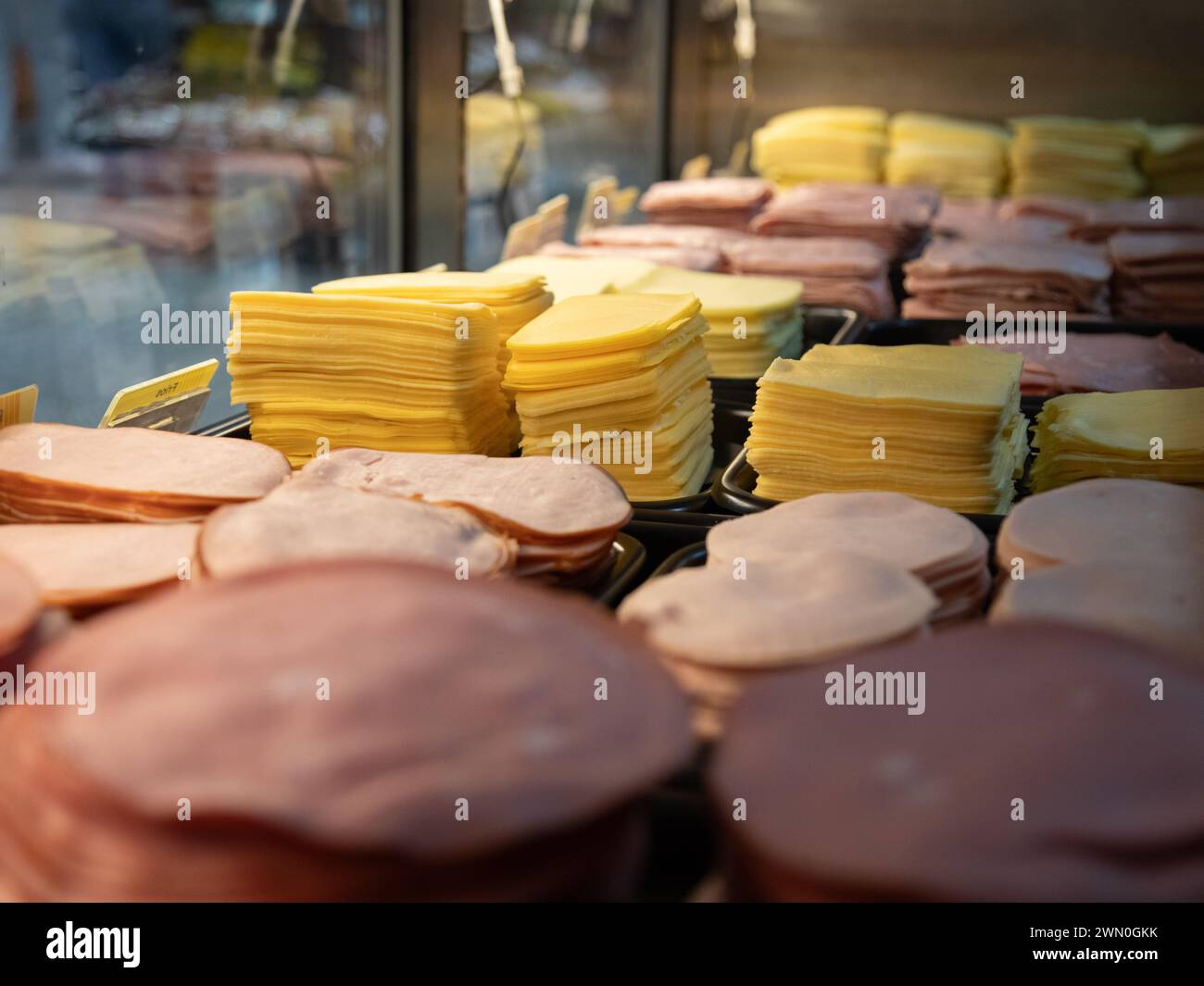 ham and cheese in showcase at market Stock Photo - Alamy