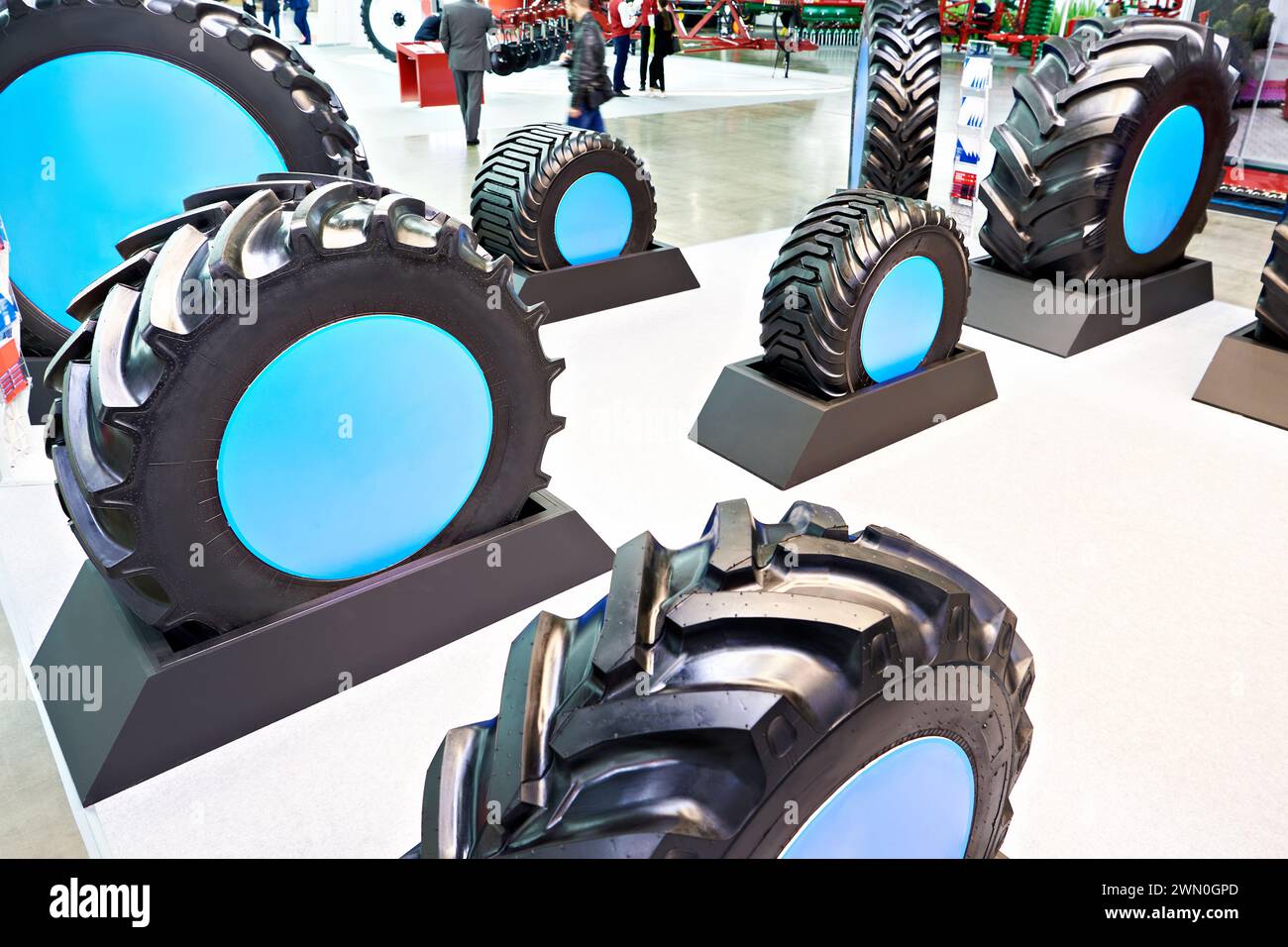Tractor tires in shop at exhibition Stock Photo - Alamy