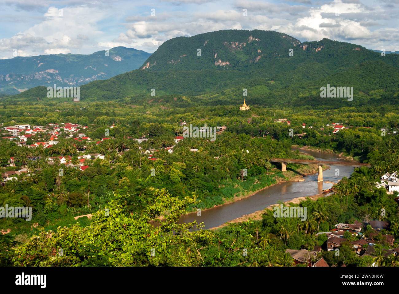 View of the Nam Khan river and the old French bridge from Phou Si hill ...