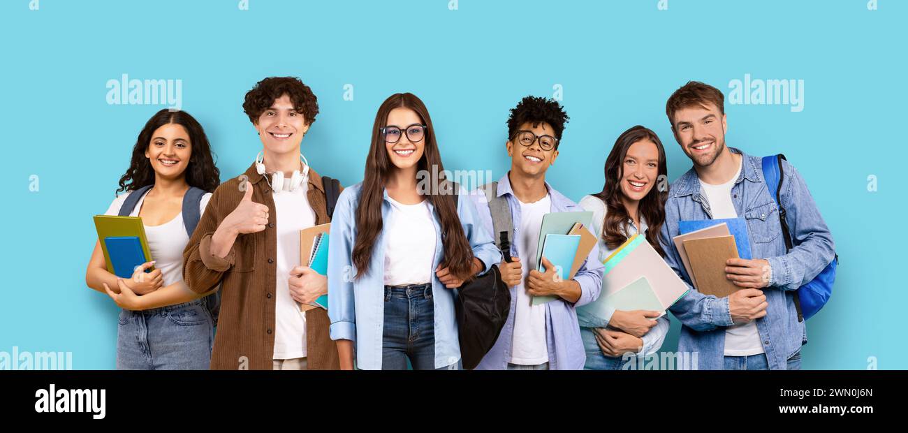 Enthusiastic group of five young students with backpacks and books ...