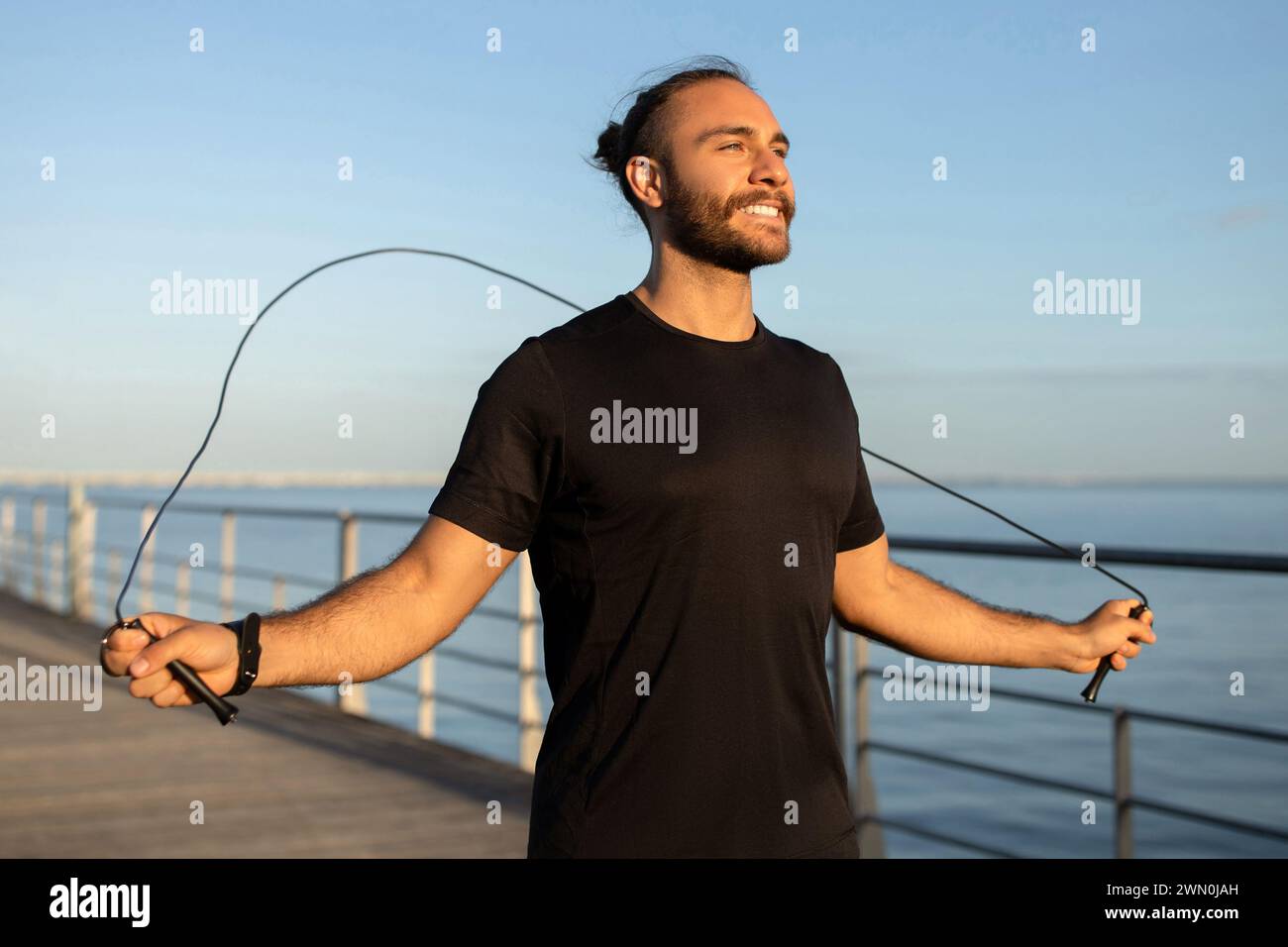 Man jumping rope and beach hi-res stock photography and images - Alamy