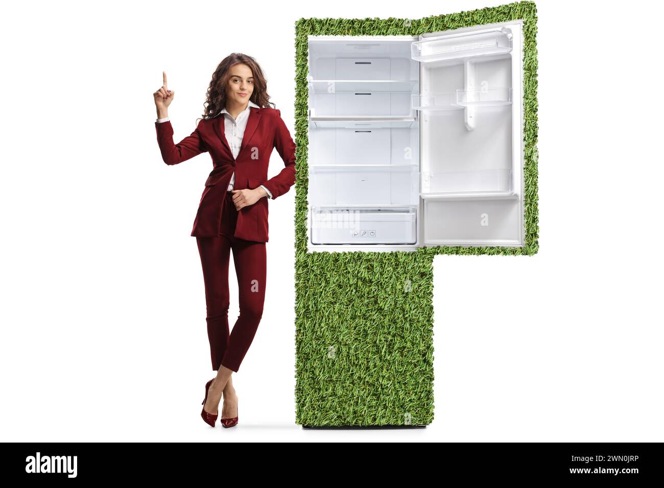 Full length portrait of a young woman in formal clothes leaning on a ...