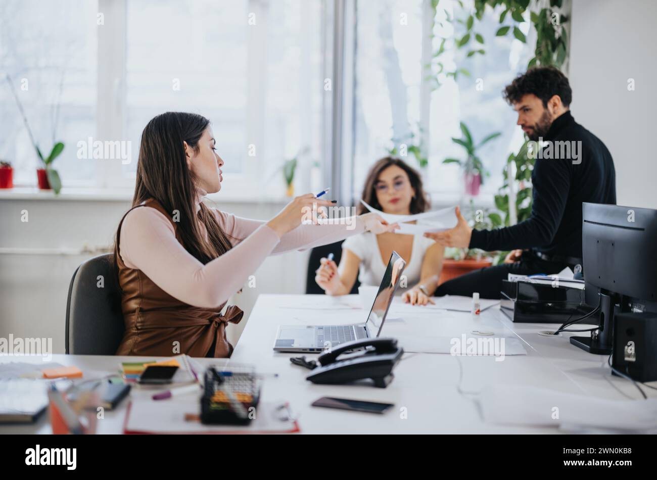 Collaborative teamwork in a bright office space with diverse colleagues ...