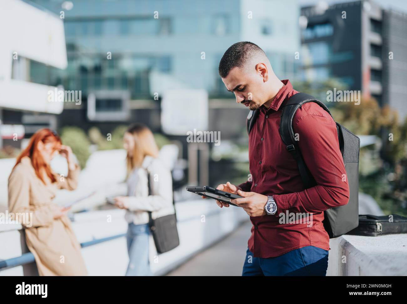 A young team in an urban city brainstorming ideas for business ...