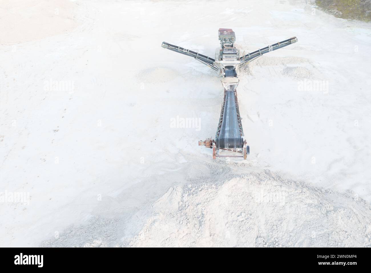 Moveable conveyor belt in a chalk quarry from above Stock Photo - Alamy