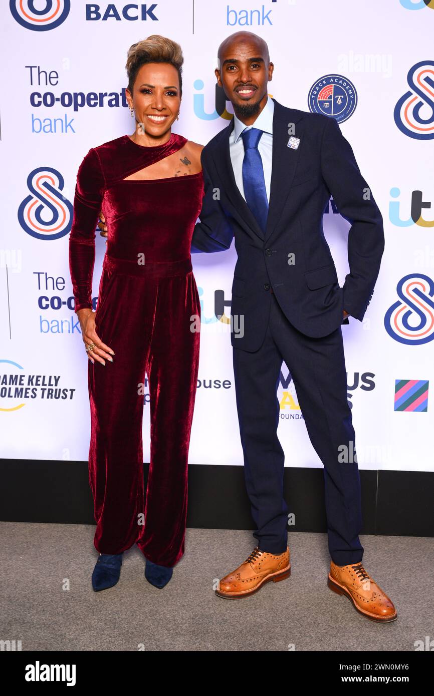London, UK. 28 February 2023. Dame Kelly Holmes and Sir Mo Farah ...