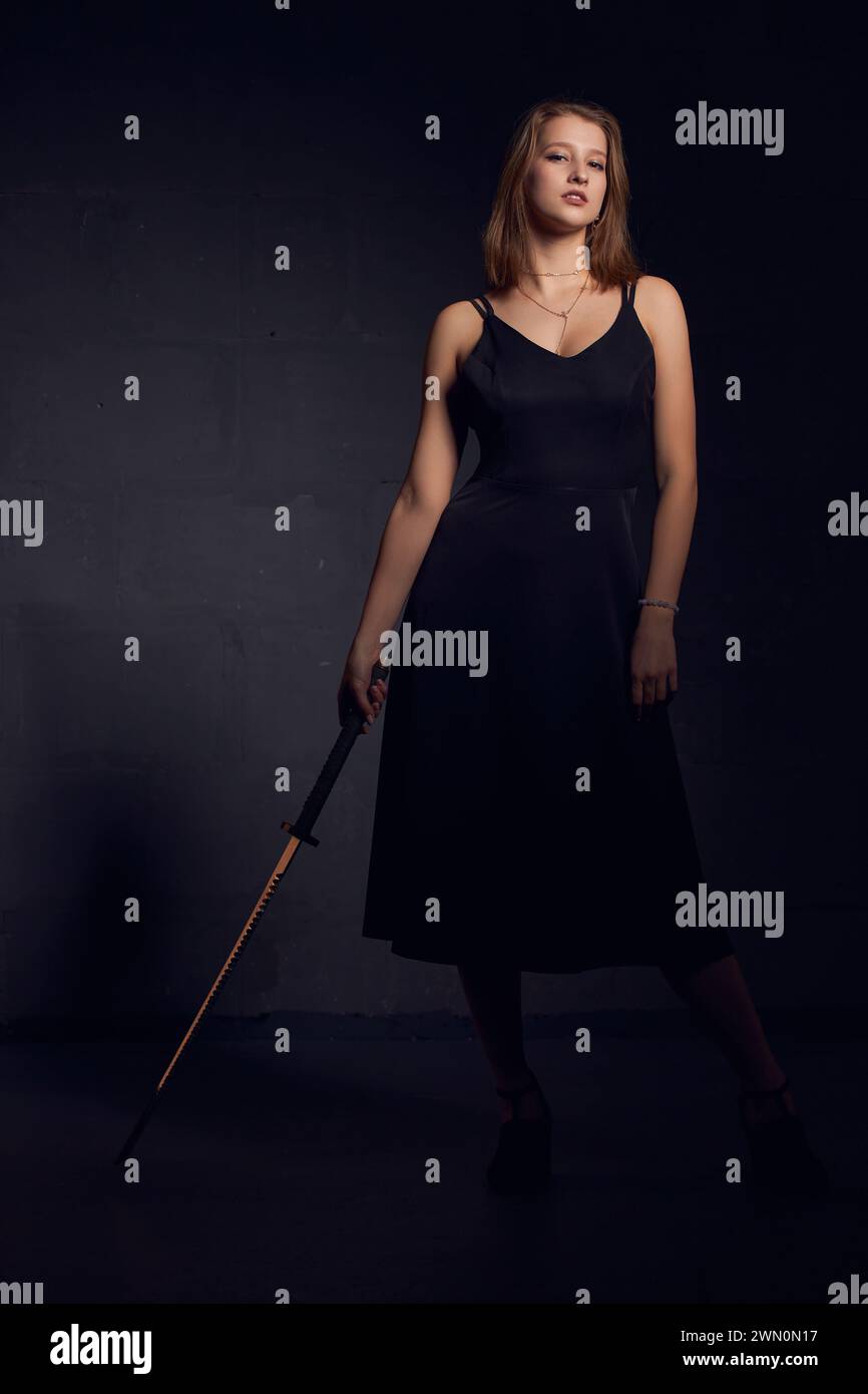 Young woman katana sword hi-res stock photography and images - Alamy