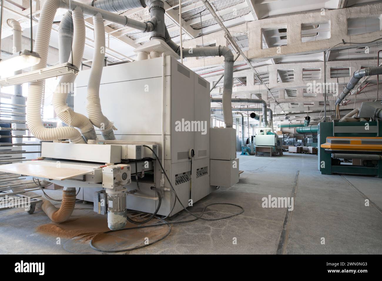Bright factory with lots of modern conveyors Stock Photo - Alamy
