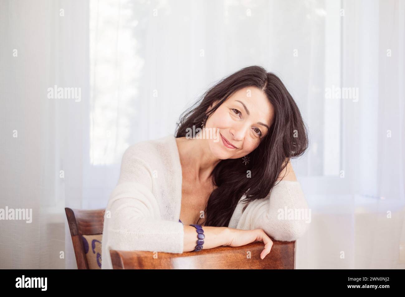 Serene lady lost in thought, gentle smile, possible emotional changes ...