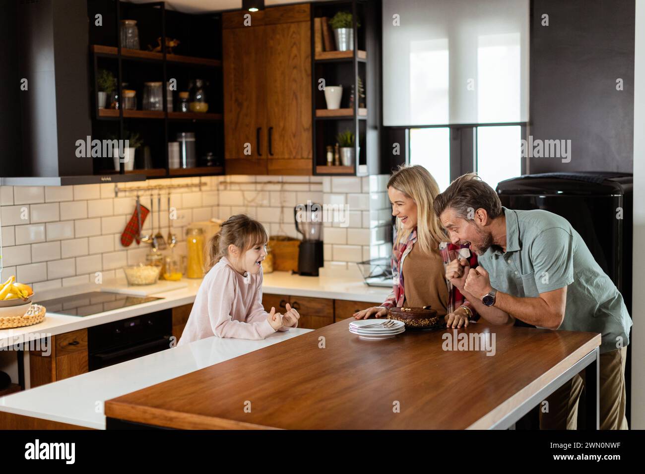 Family celebration unfolds hi-res stock photography and images - Alamy