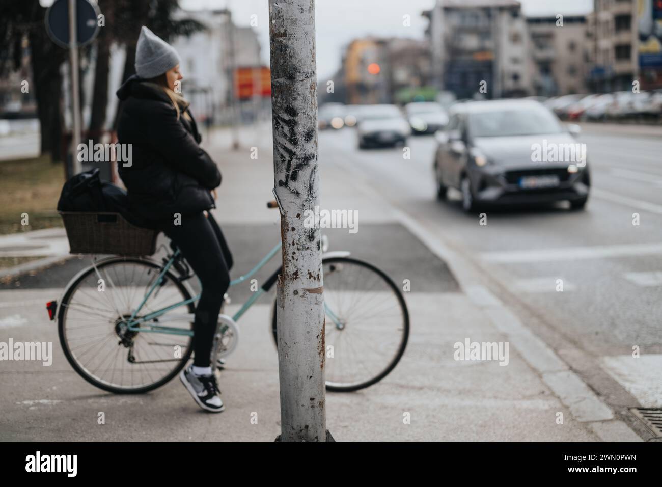 Woman commuter pausing on street hi-res stock photography and images ...