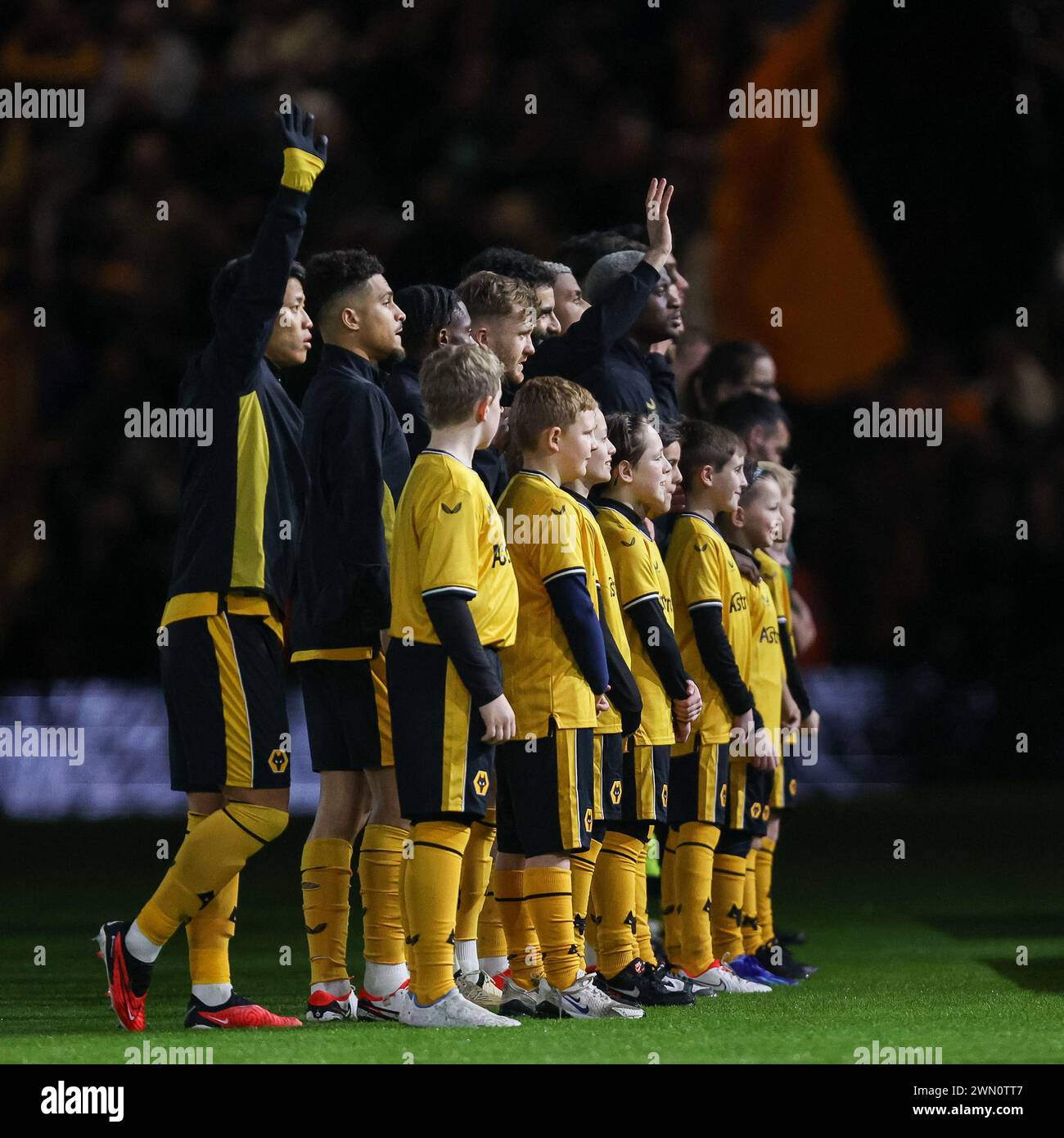 Wolverhampton, UK. 28th Feb, 2024. Wolves' players with mascots ahead ...