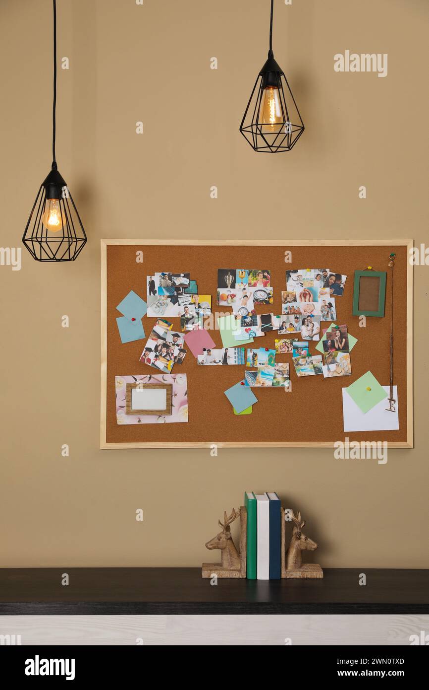 Stylish room interior with vision board and decor elements Stock Photo ...