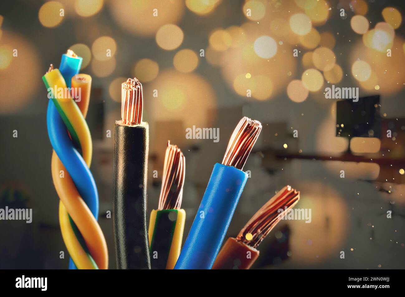 Colorful electrical wires against blurred background, closeup. Bokeh ...