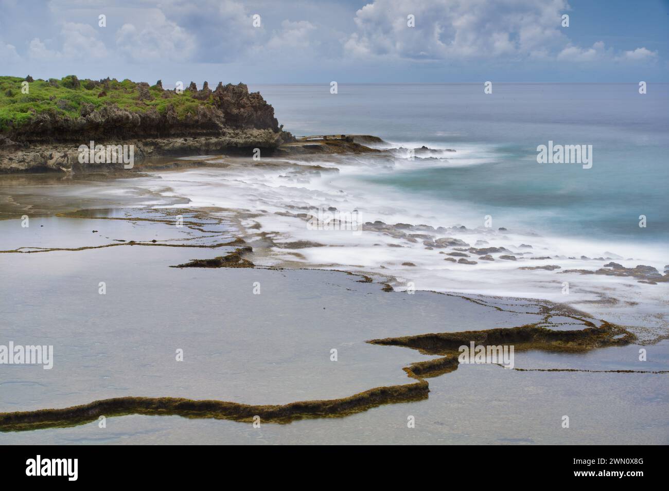The unique coastline of Inarajan Pools Beach Park, Guam with a long ...