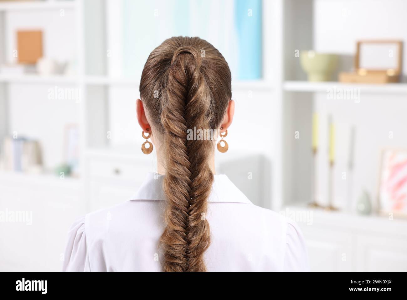 Woman plait back view hi-res stock photography and images - Alamy