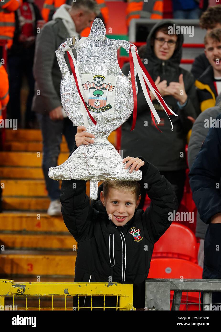 A Southampton fan with a foil replica FA cup trophy during the Emirates ...