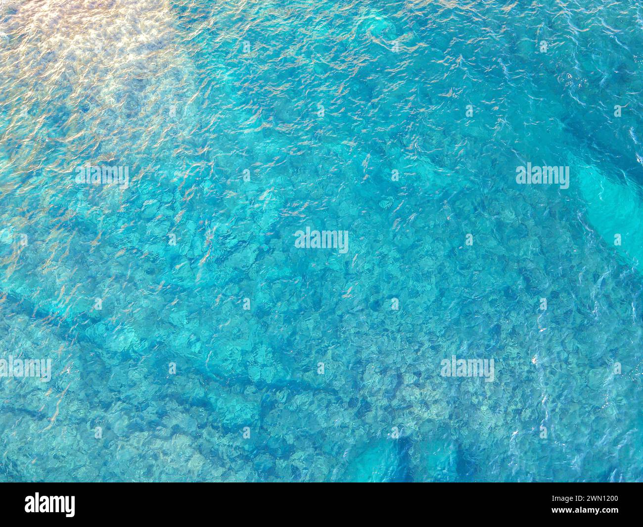 Aerial view to ocean waves. Blue water background Stock Photo - Alamy