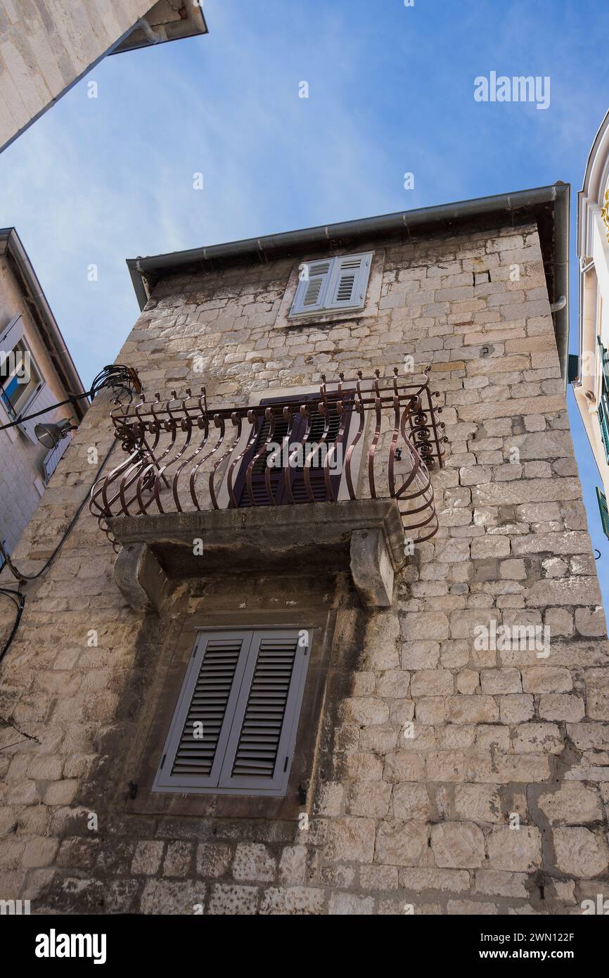 street view of the upper floors of stone medieval residential buildings ...