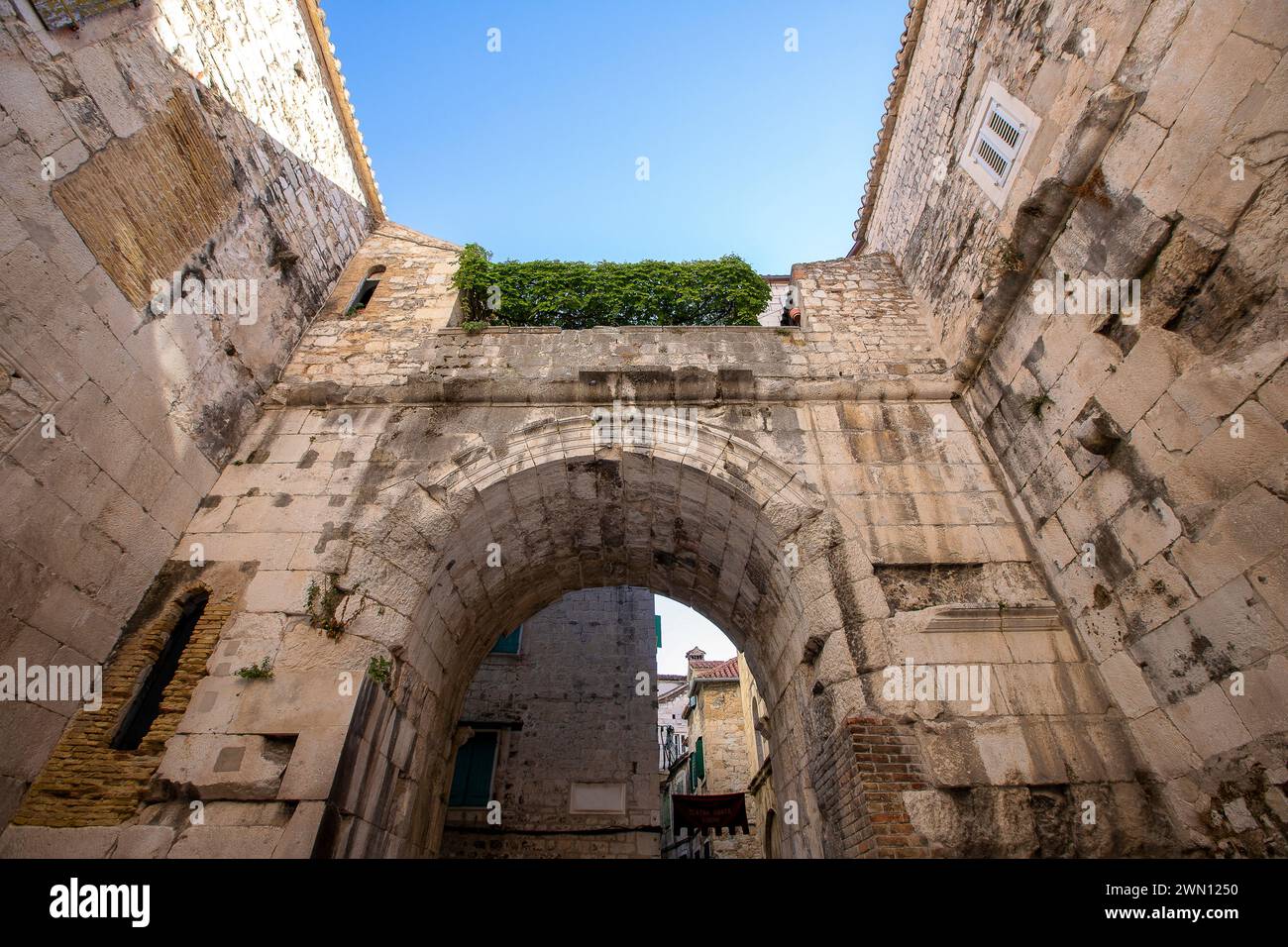 street view of the upper floors of stone medieval residential buildings ...
