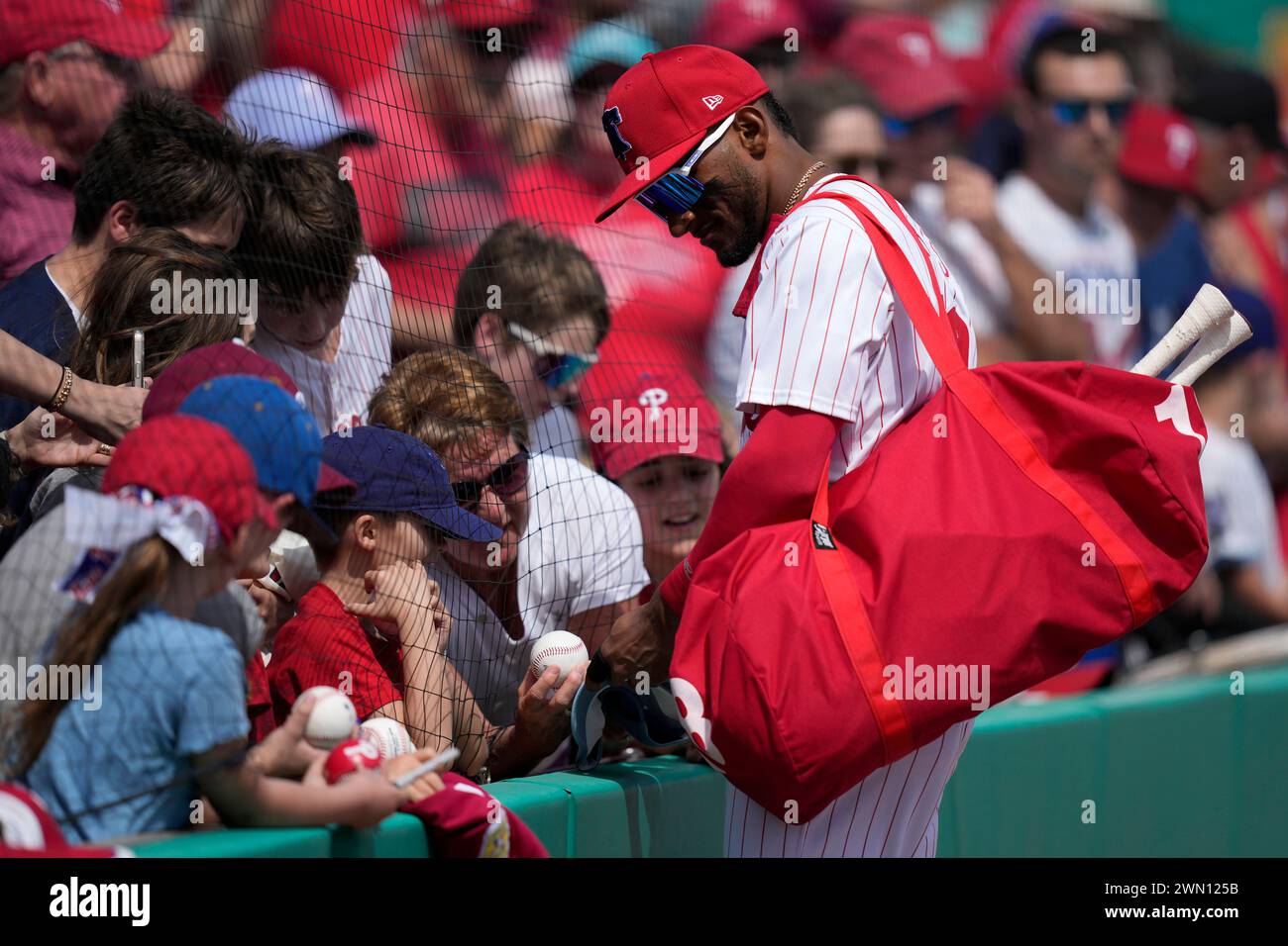 Philadelphia Phillies center fielder Johan Rojas signs autographs ...