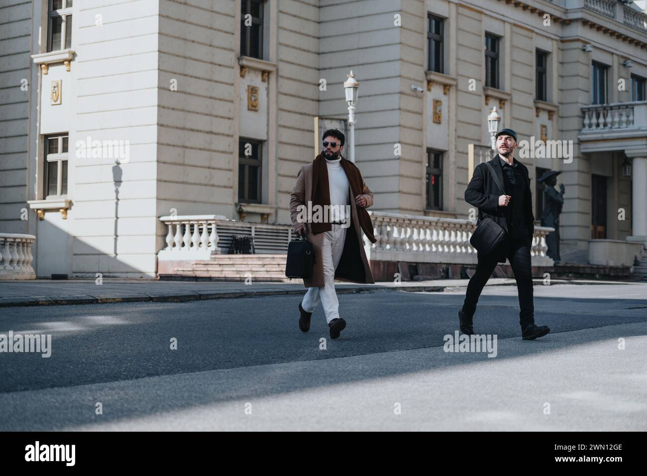 Stylish two men confidently hi-res stock photography and images - Alamy
