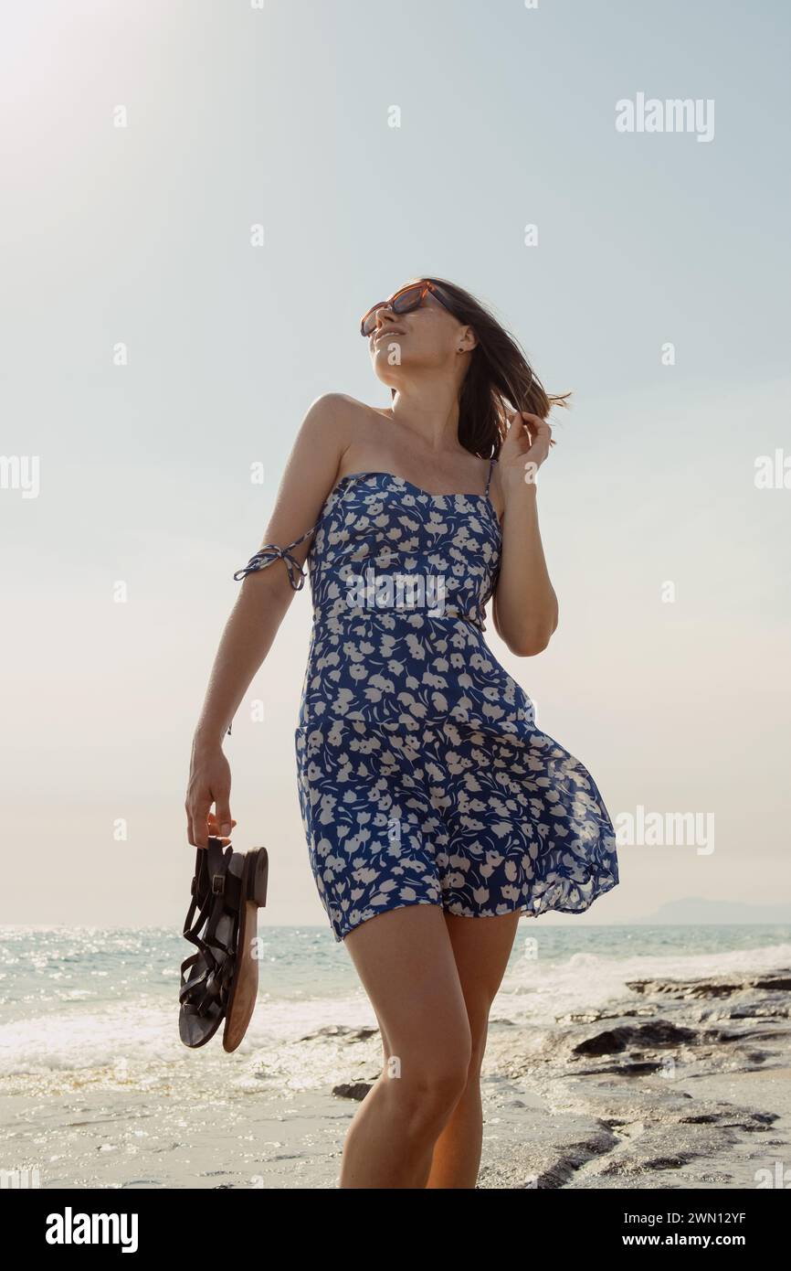 Woman Basking in the Sunlight Stock Photo - Alamy