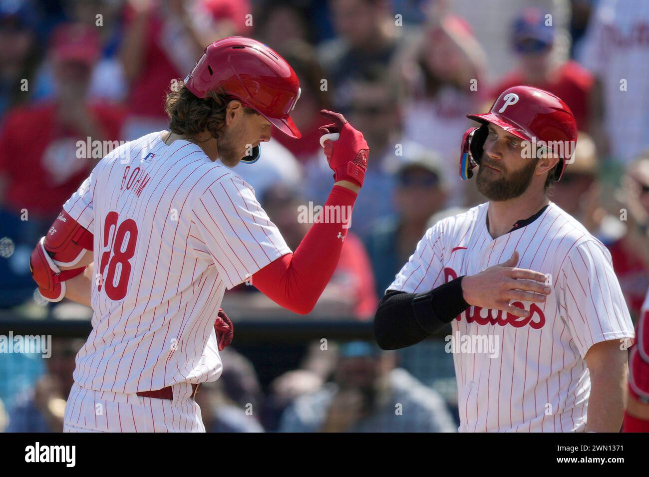 Philadelphia Phillies third baseman Alec Bohm, left, celebrates with ...