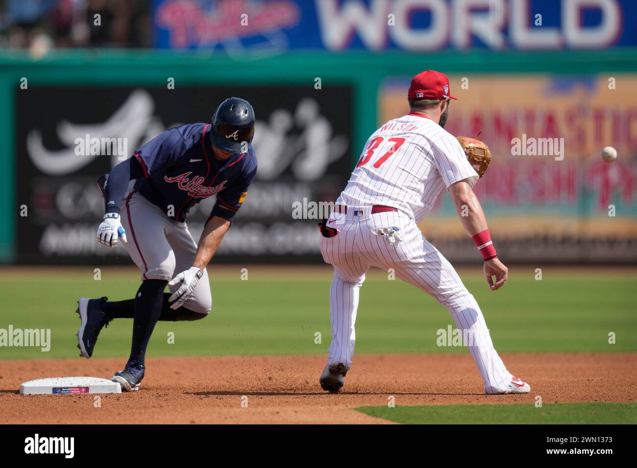 Atlanta Braves designated hitter Eli White reaches second base in front ...