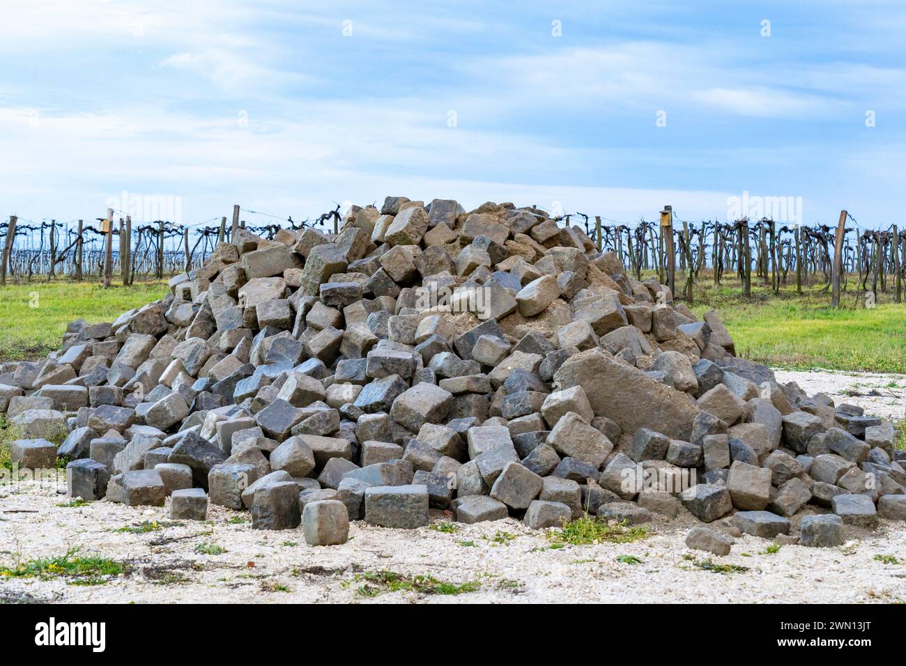 A pile of gray cube stones in a vineyard Stock Photo - Alamy