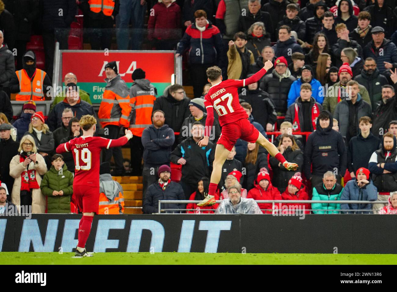 Liverpool's Lewis Koumas, right, celebrates after scoring his side's ...