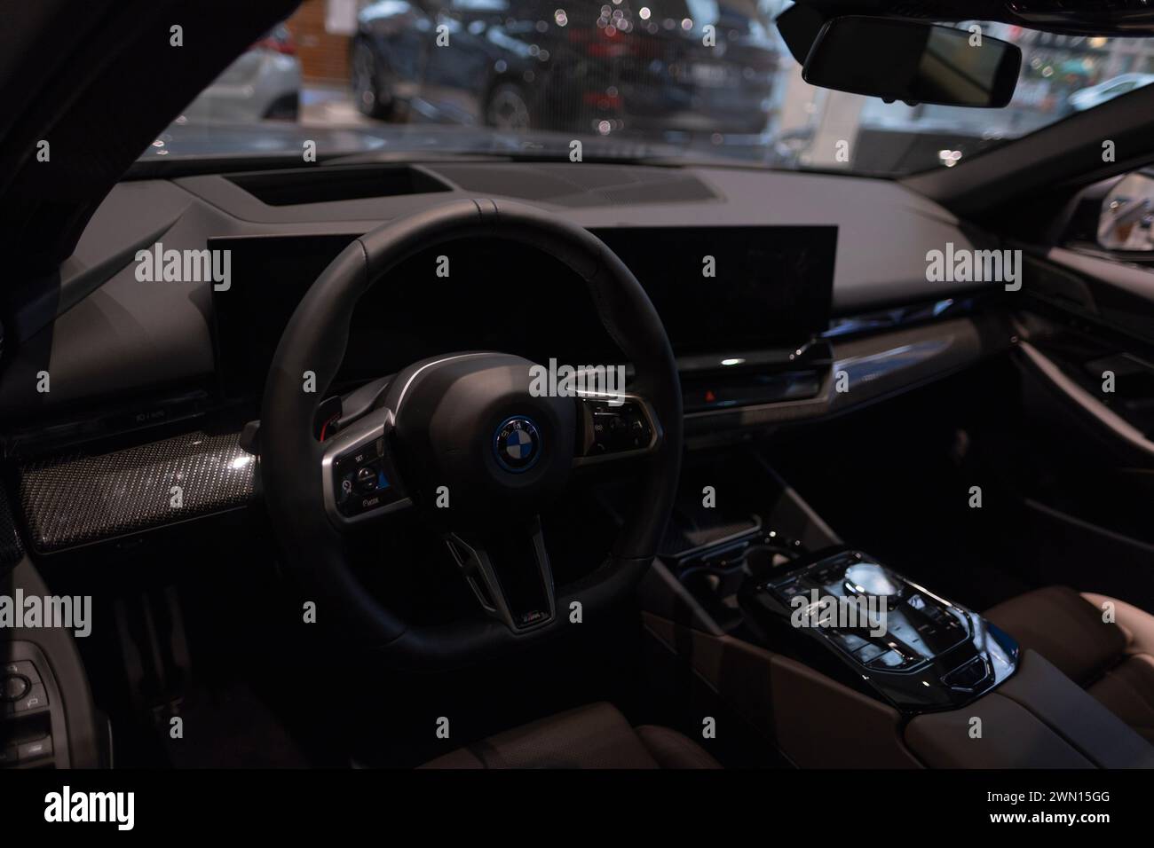 Interior, cockpit of BMW i5 eDrive40 car, digital panel, instruments on ...