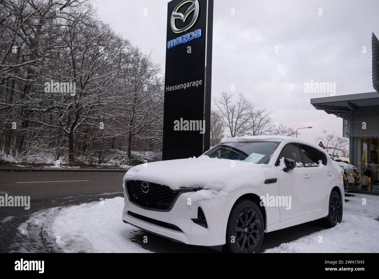 Mazda CX-90 Plug-in Hybrid Electric in snow front Advertising banners ...