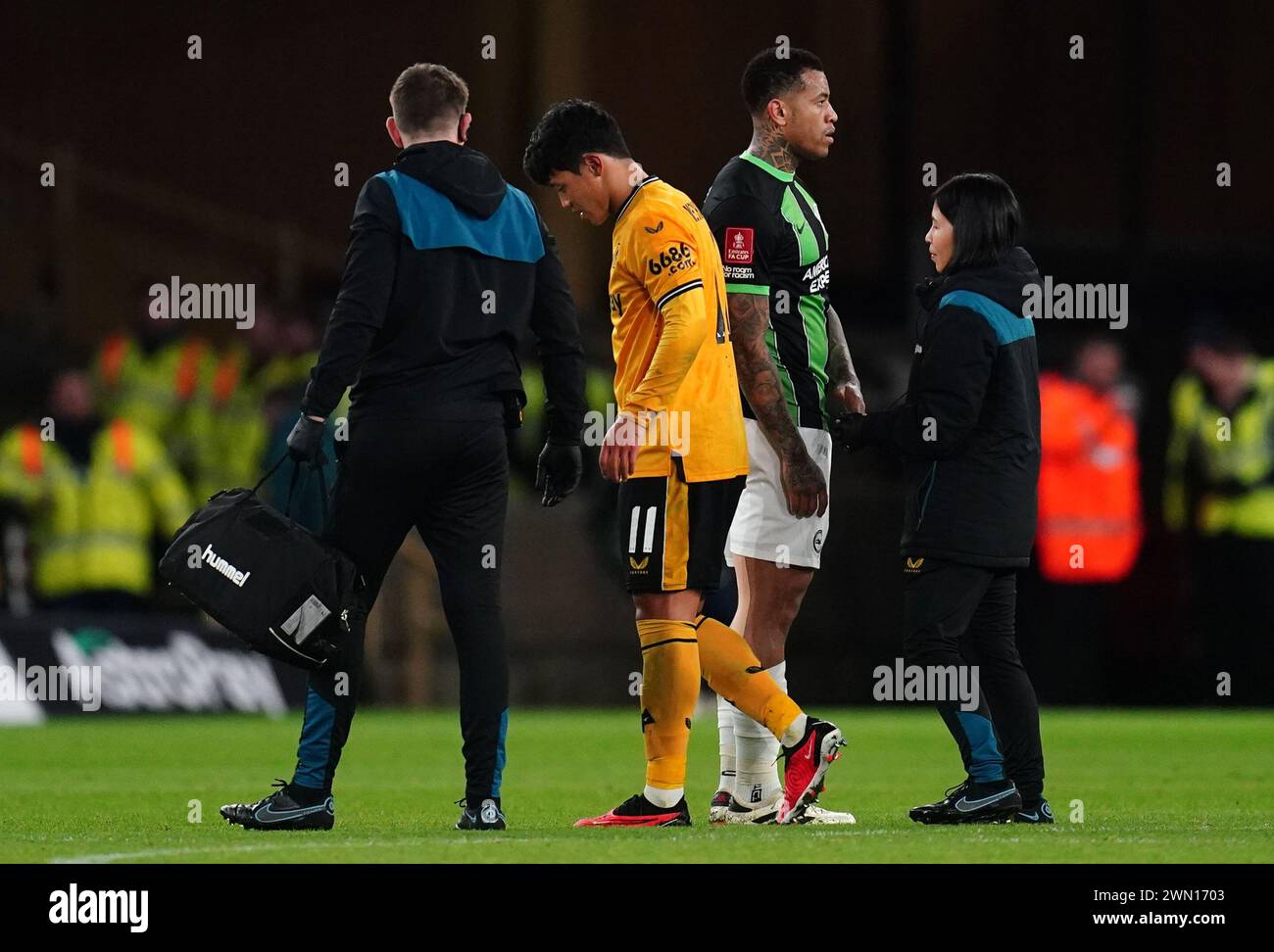 Wolverhampton Wanderers' Hwang Hee-Chan leaves the game with an injury ...
