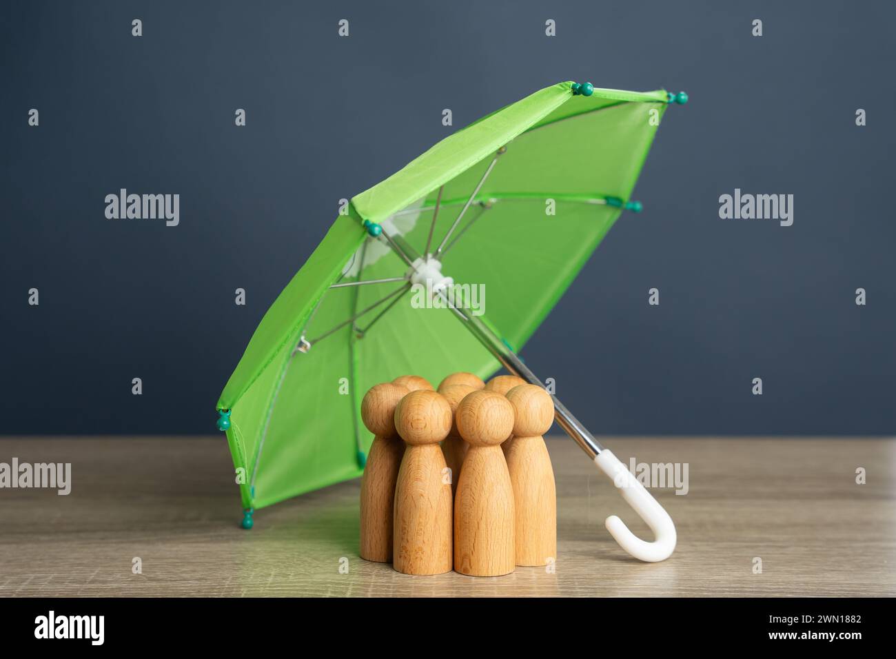 People under an umbrella. Customer care. Human resources. Protection of ...