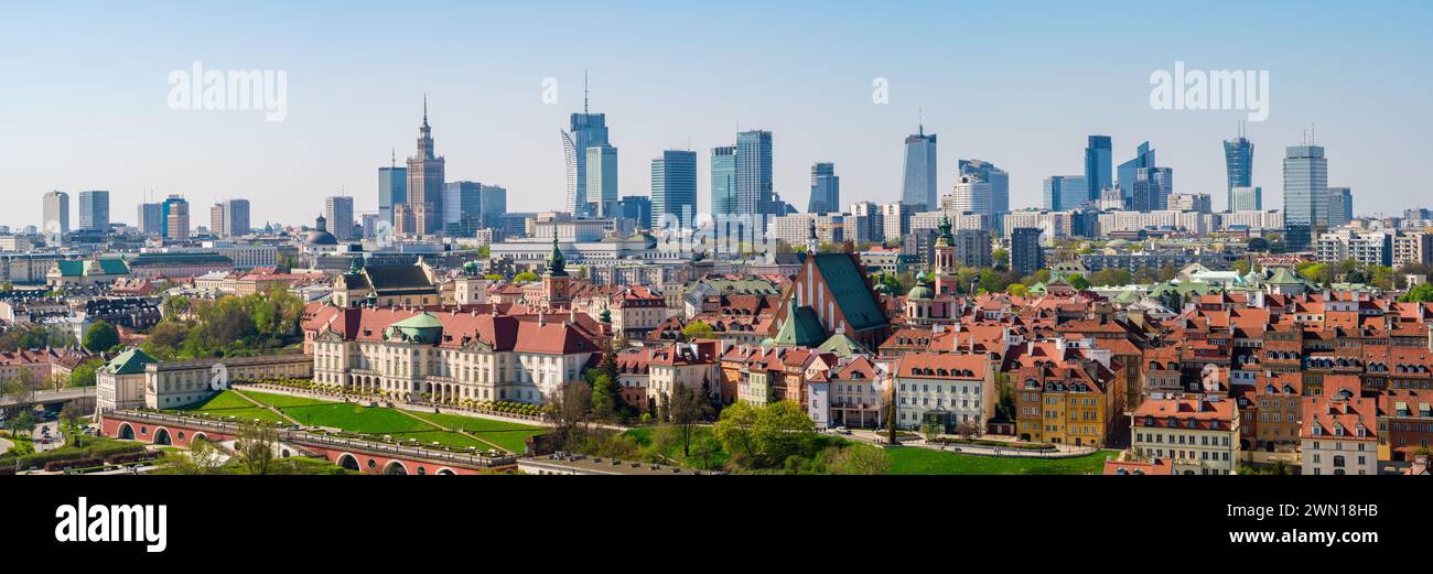 Warsaw old town and distant city center, PKiN and skyline under blue ...