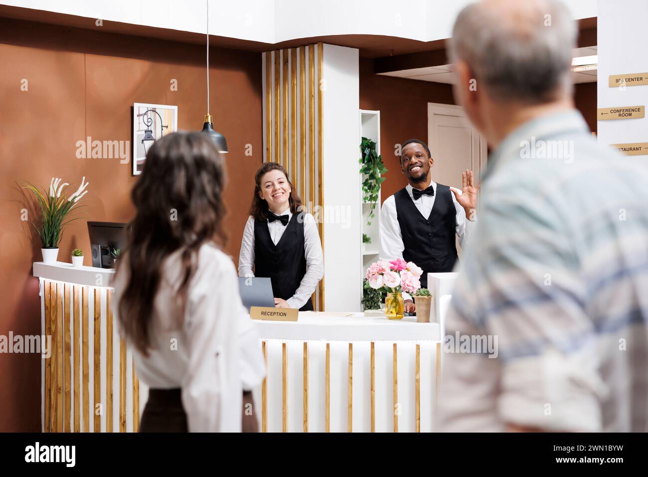 Couple entering hotel room hi-res stock photography and images - Alamy