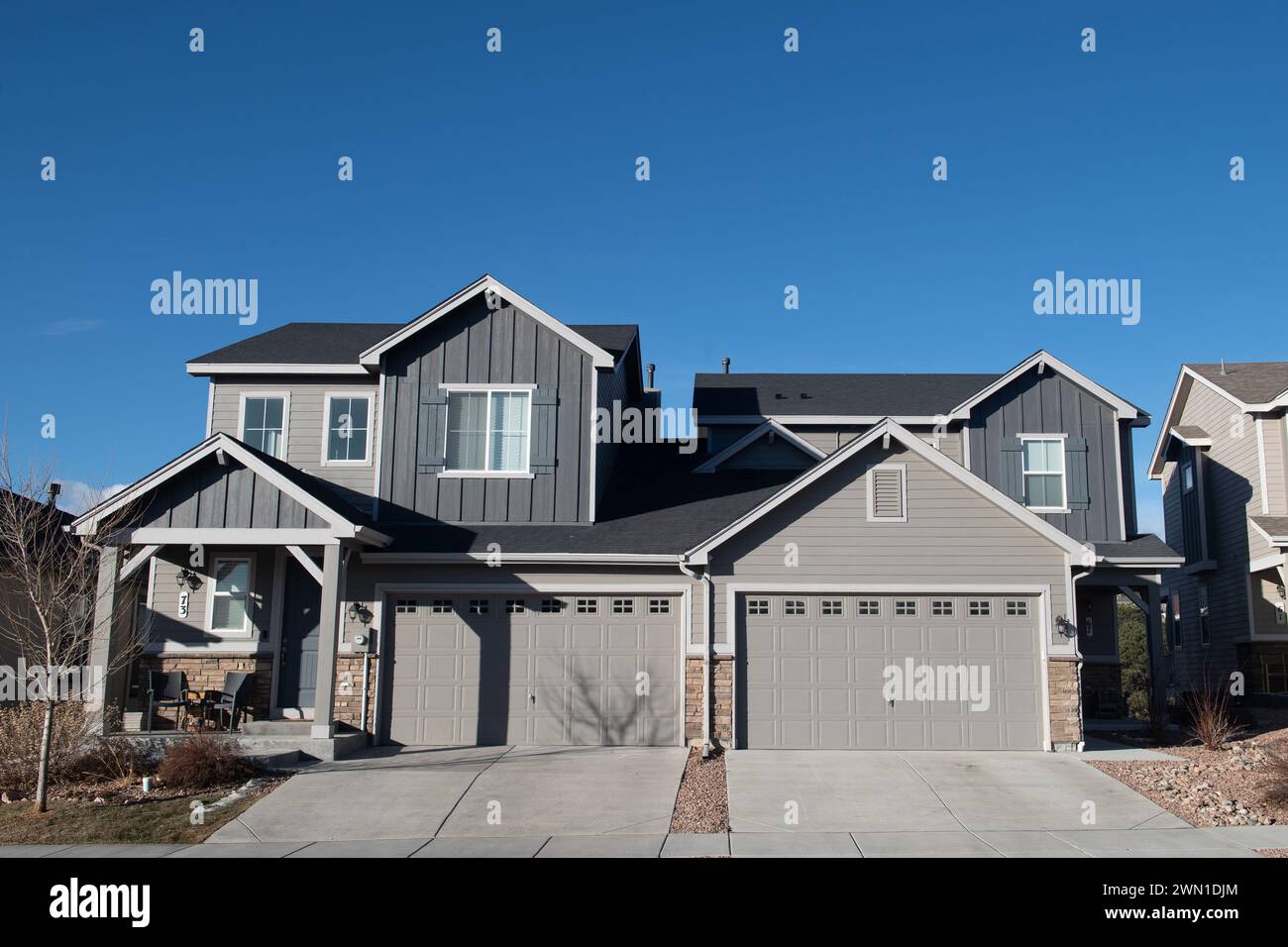 Modern duplexes with garage hi-res stock photography and images - Alamy