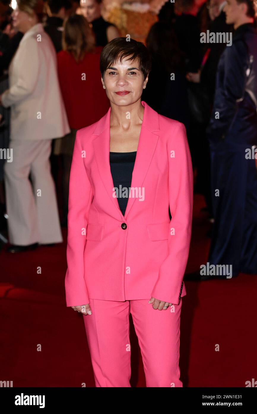 Rina Mahoney poses for photographers upon arrival at the UK premiere of ...