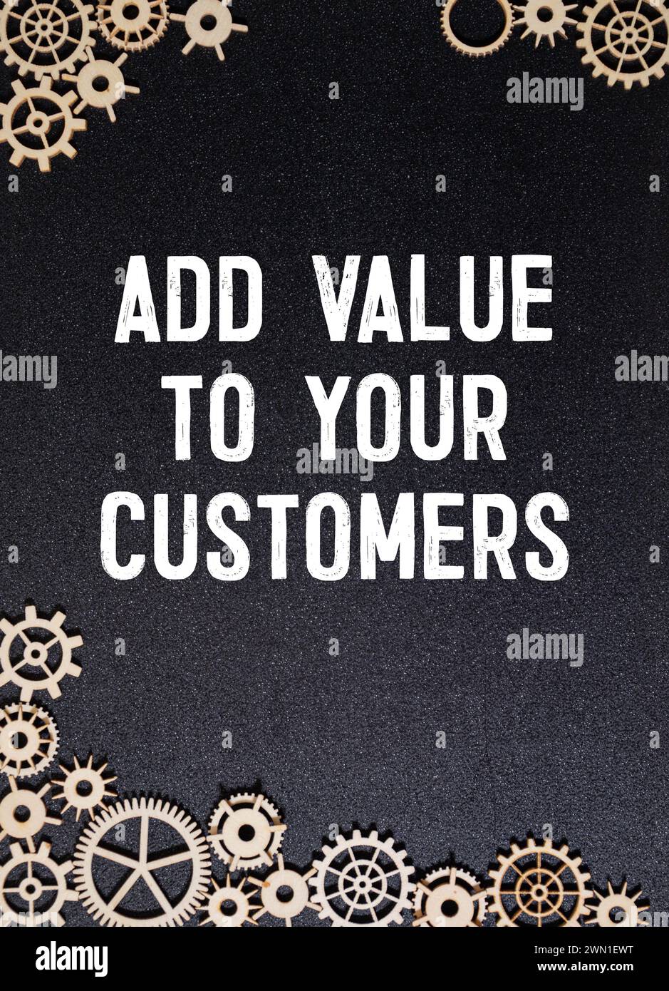 ADD VALUE TO YOUR CUSTOMERS, text on white paper on wood background ...