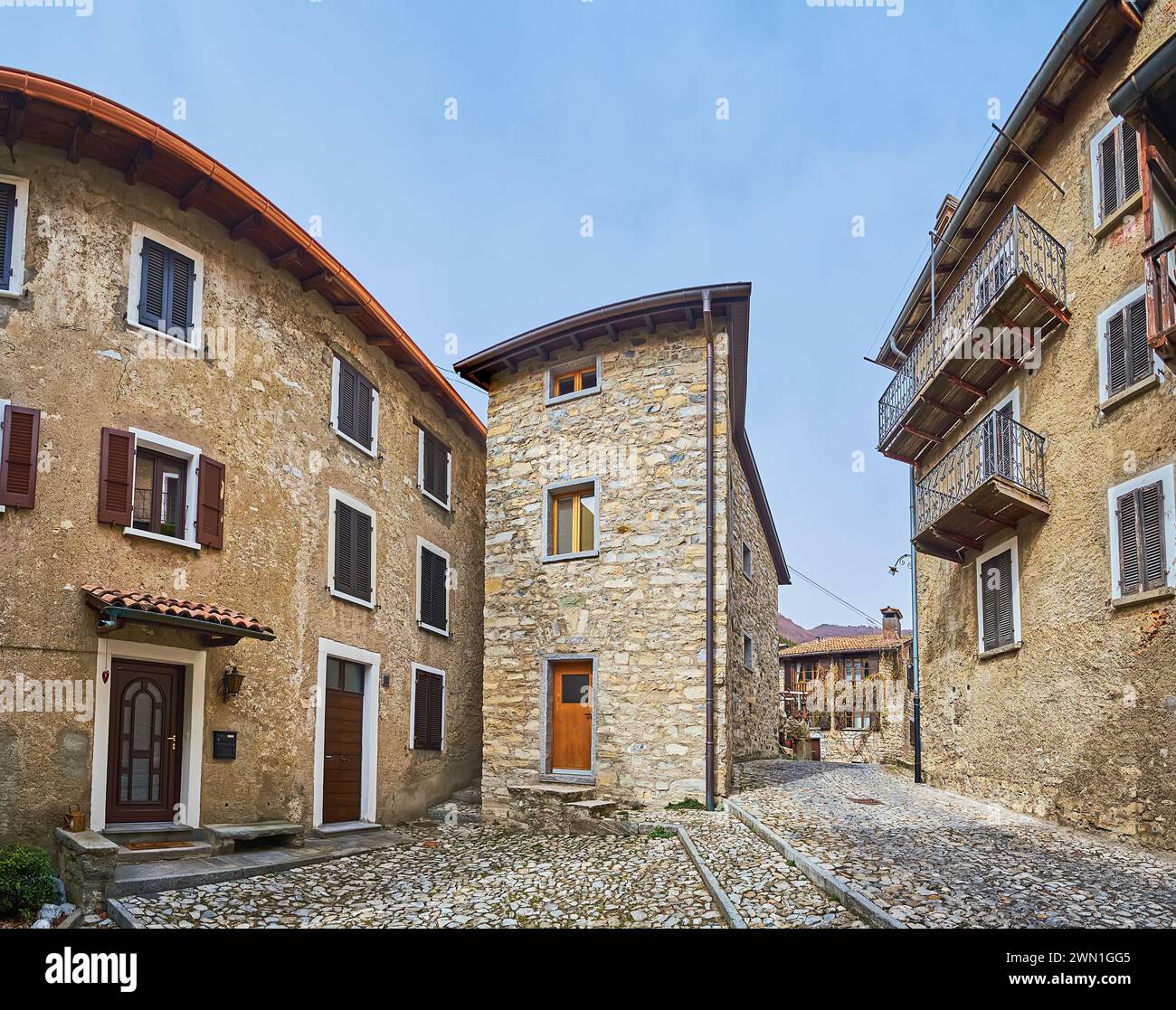 Panorama of the stone street and old houses in Bre village, Ticino ...