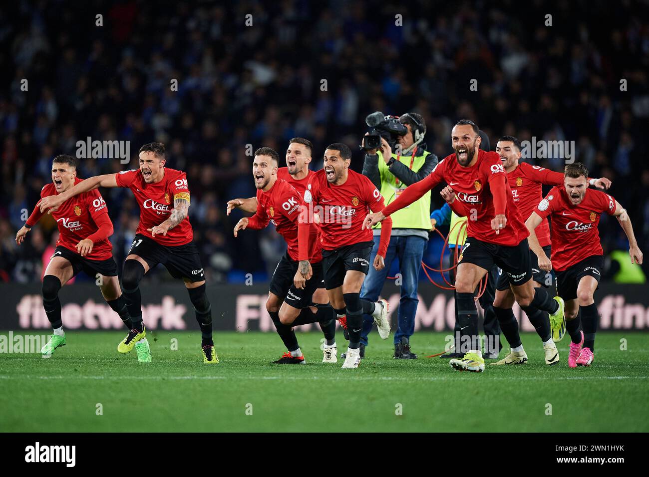 Players of RCD Mallorca celebrate after the team's victory in the ...