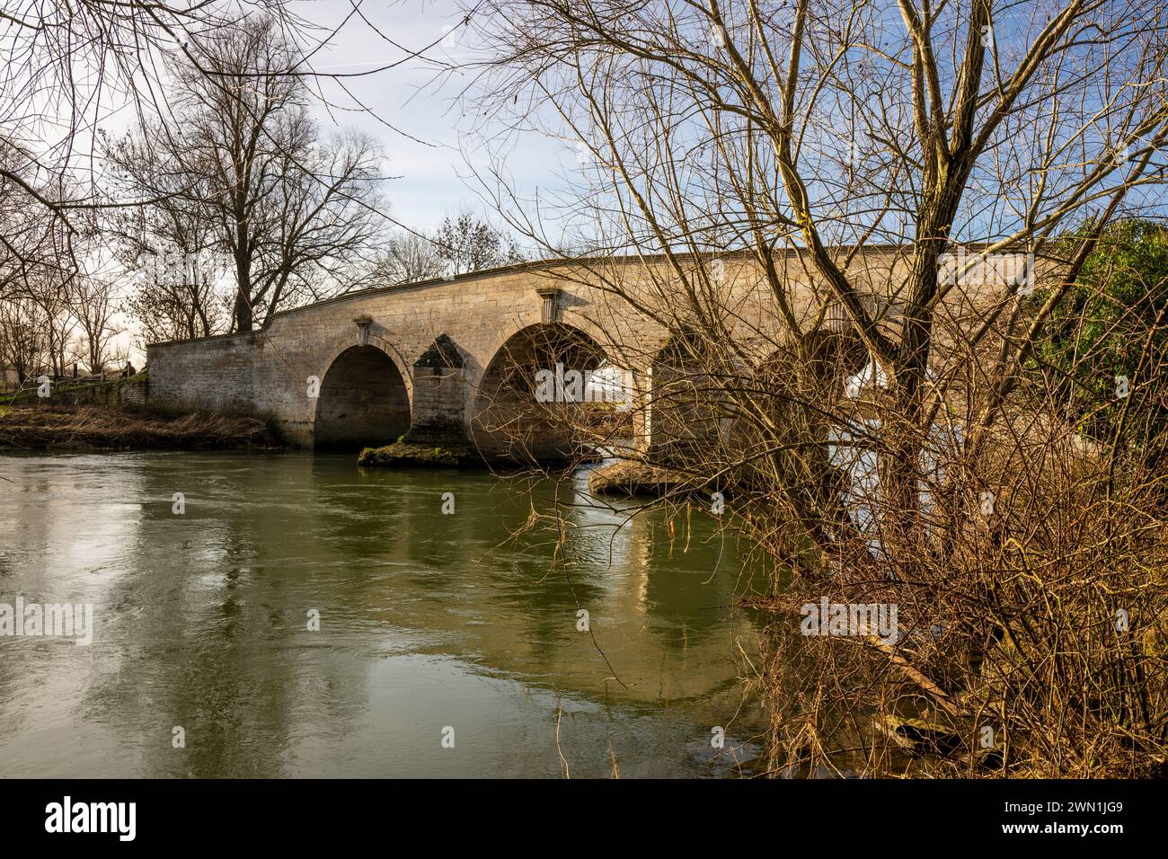 MIlton Ferry Bridge, an old limestone bridge across the River Nene on ...