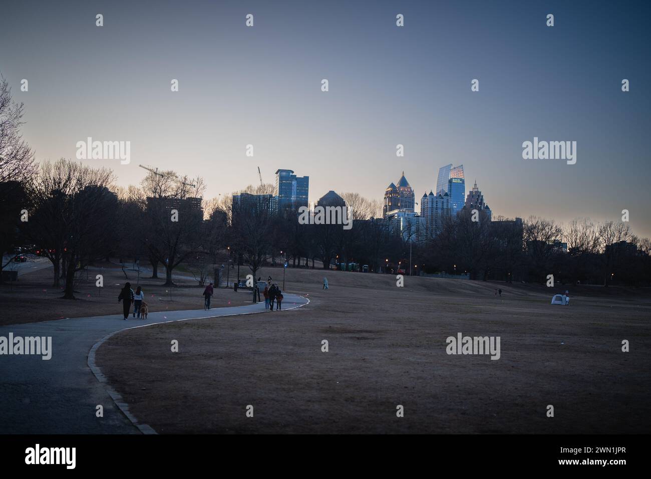 Panoramic view of Atlanta skyline during sunset shot from Piedmont Park ...