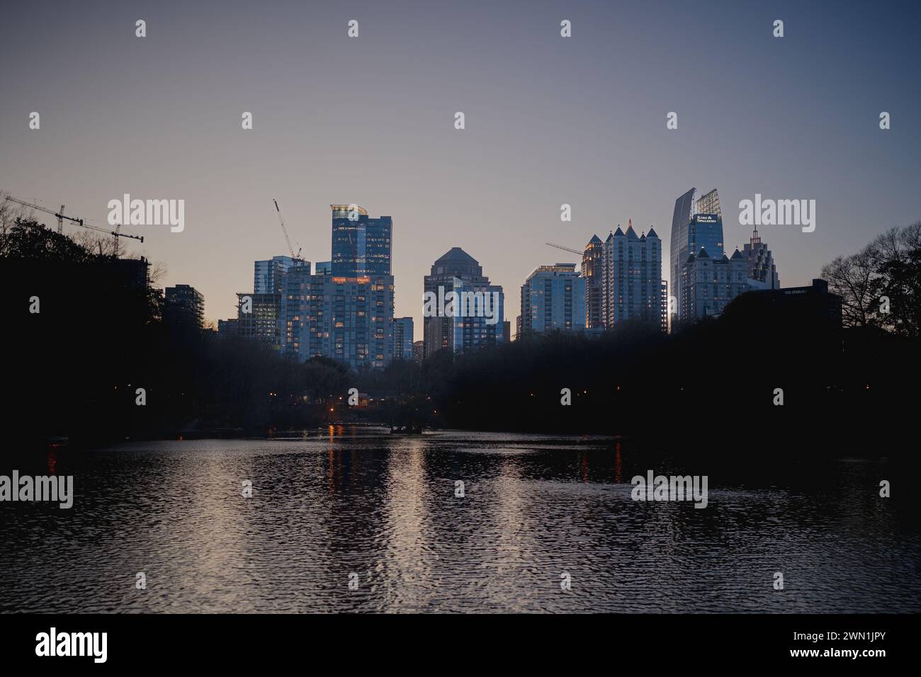 Panoramic view of Atlanta skyline during sunset shot from Piedmont Park ...