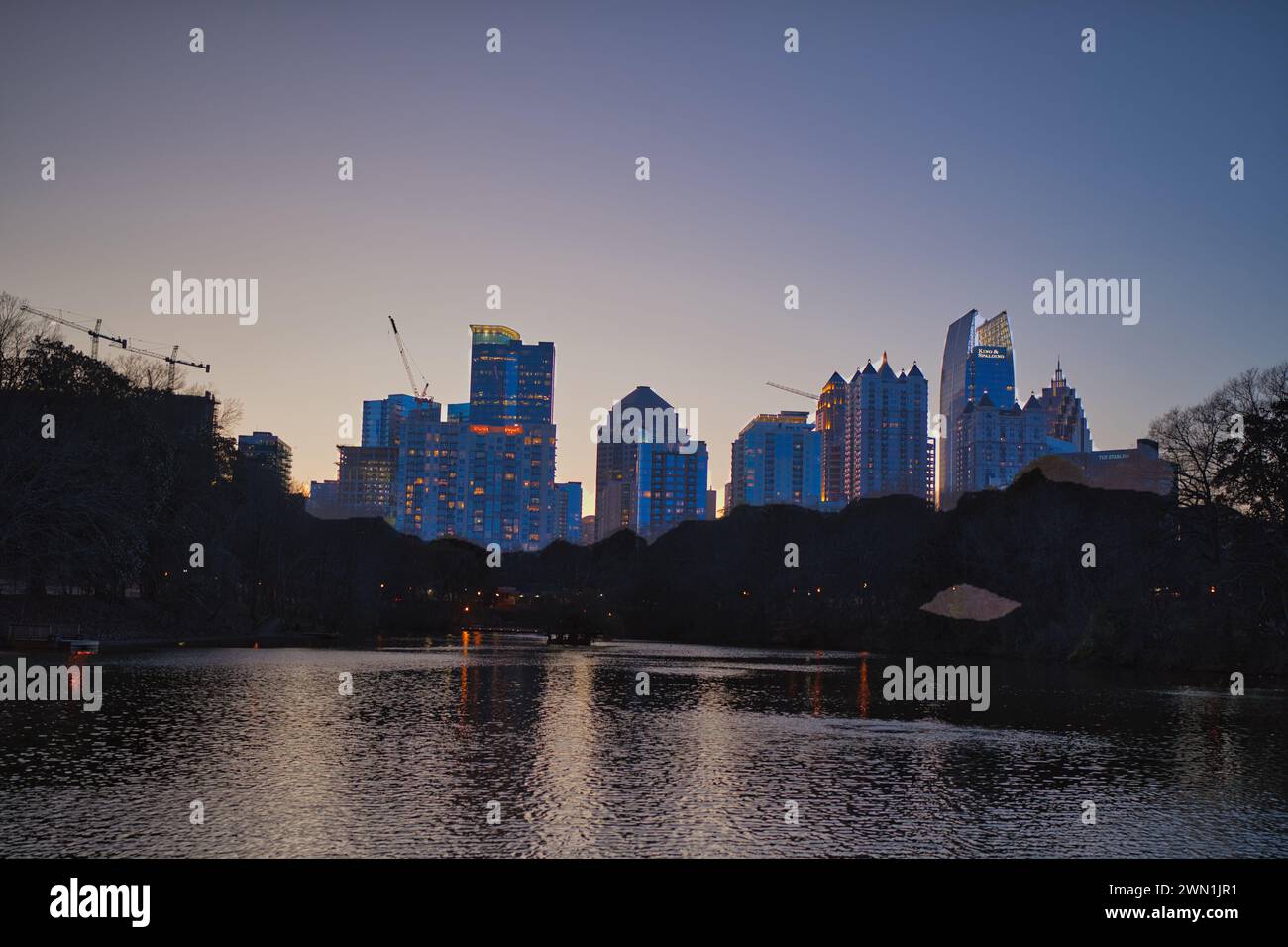 Panoramic view of Atlanta skyline during sunset shot from Piedmont Park ...