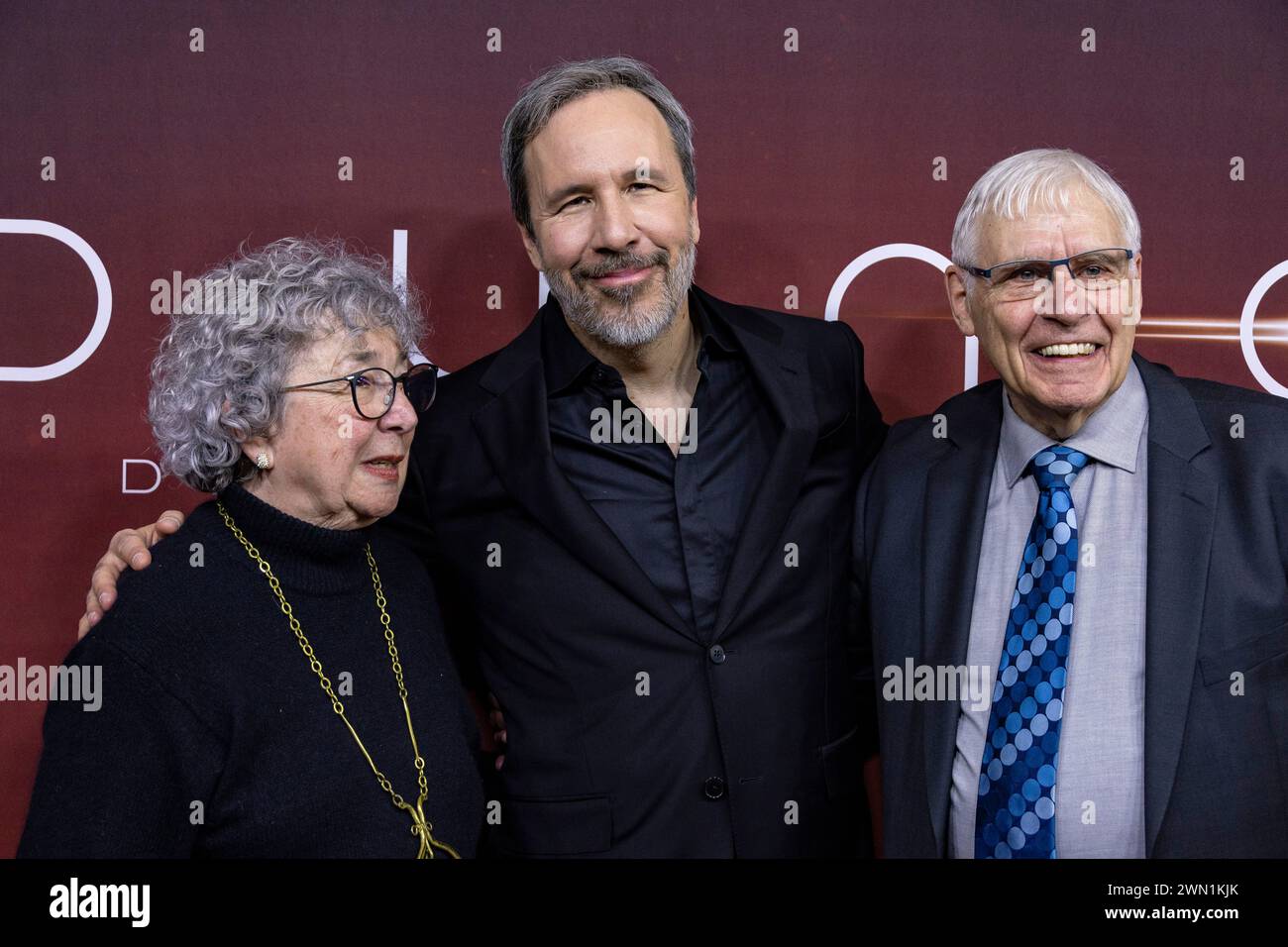 Director Denis Villeneuve, center, poses with his parents Nicole Demers ...