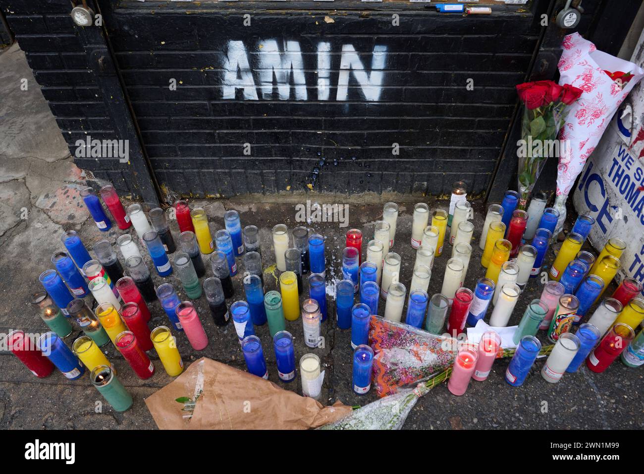 New York, New York, USA. 28th Feb, 2024. A growing memorial of candles ...