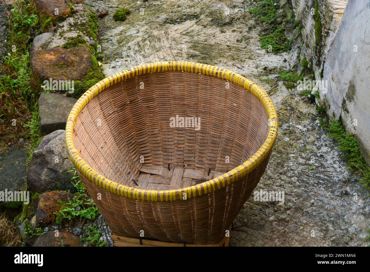 Hand woven bamboo rice basket hi-res stock photography and images - Alamy