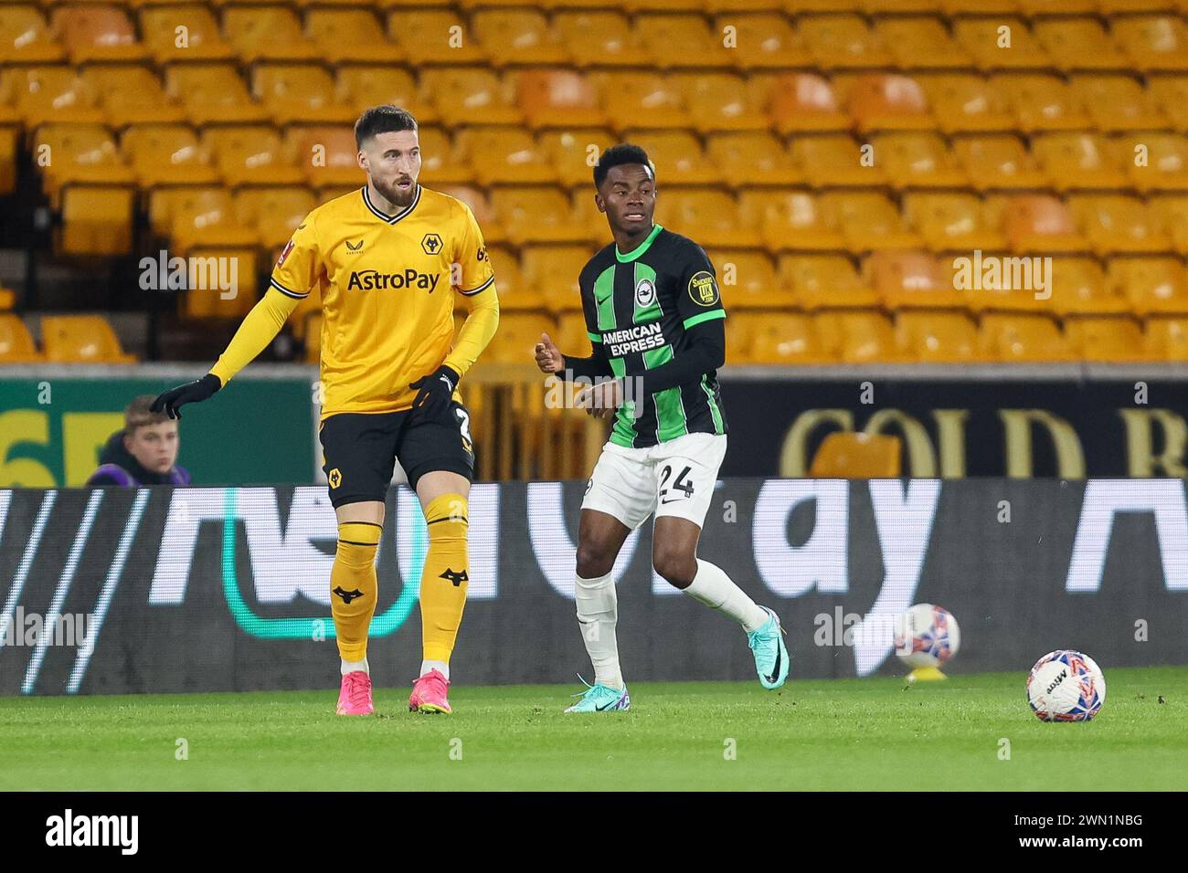 Wolverhampton, UK. 28th Feb, 2024. Wolves' Matt Doherty & Brighton's ...
